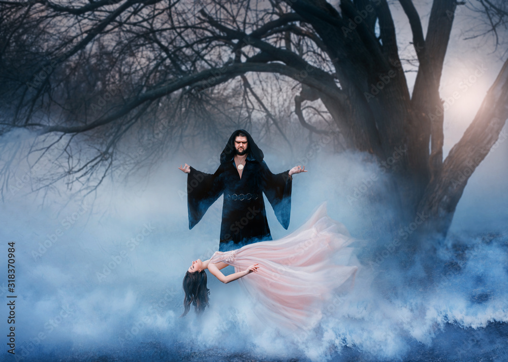 witcher men power magic spell raises woman air. Fluttering clothes ...