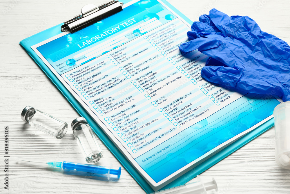 Laboratory test form with gloves and medicines on white table Stock ...