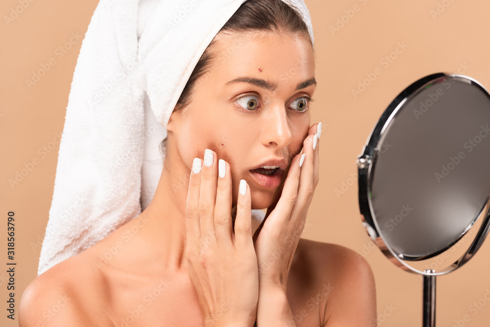 Surprised Naked Girl Touching Face With Pimples And Looking At Mirror