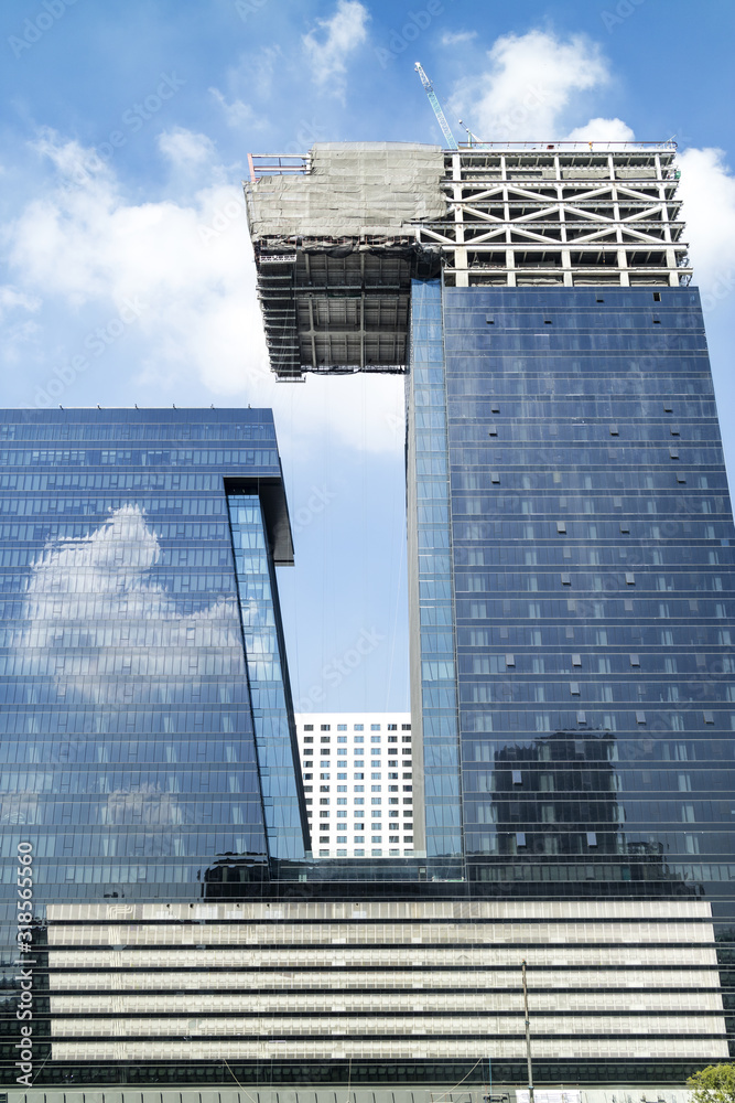 The G-Tower under construction. The hammer head on the top is a ...