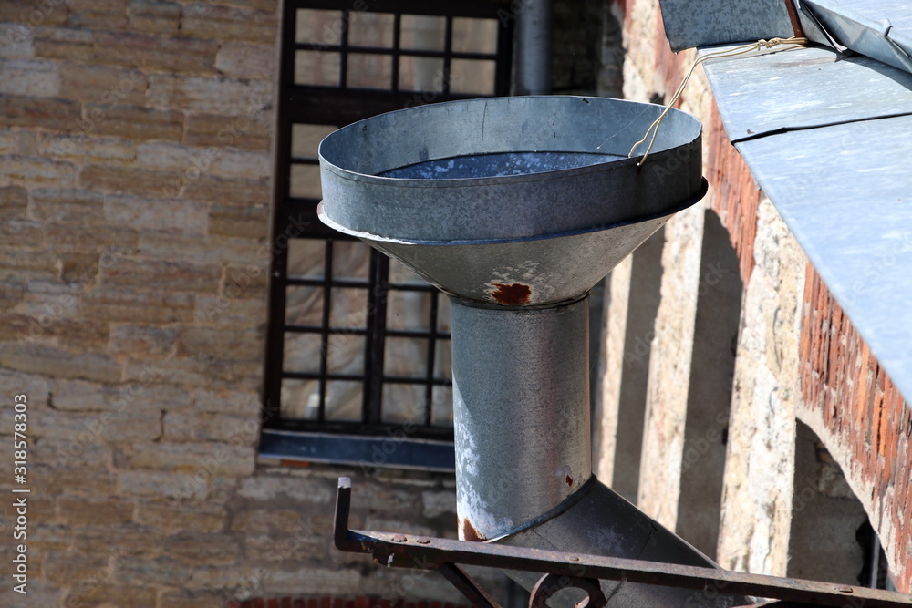 Steel Round Rainwater Hopper. Rainline rainwater drainage system on the ...
