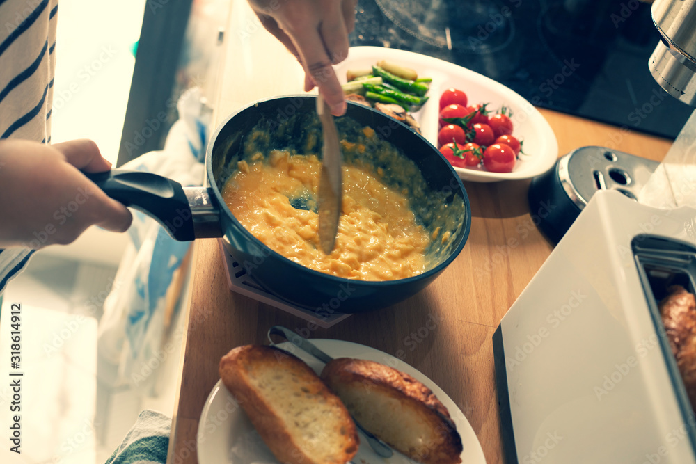 Cooking breakfast on kitchen counter bar in morning Stock Photo | Adobe ...
