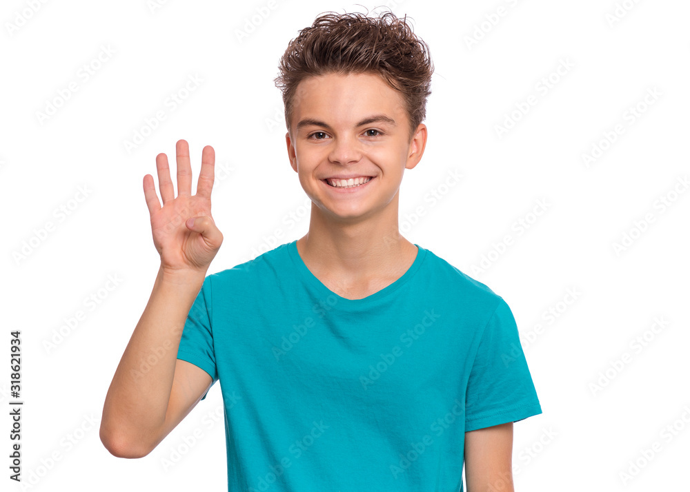 Portrait of happy teen boy showing one palm - 4 fingers, isolated on ...