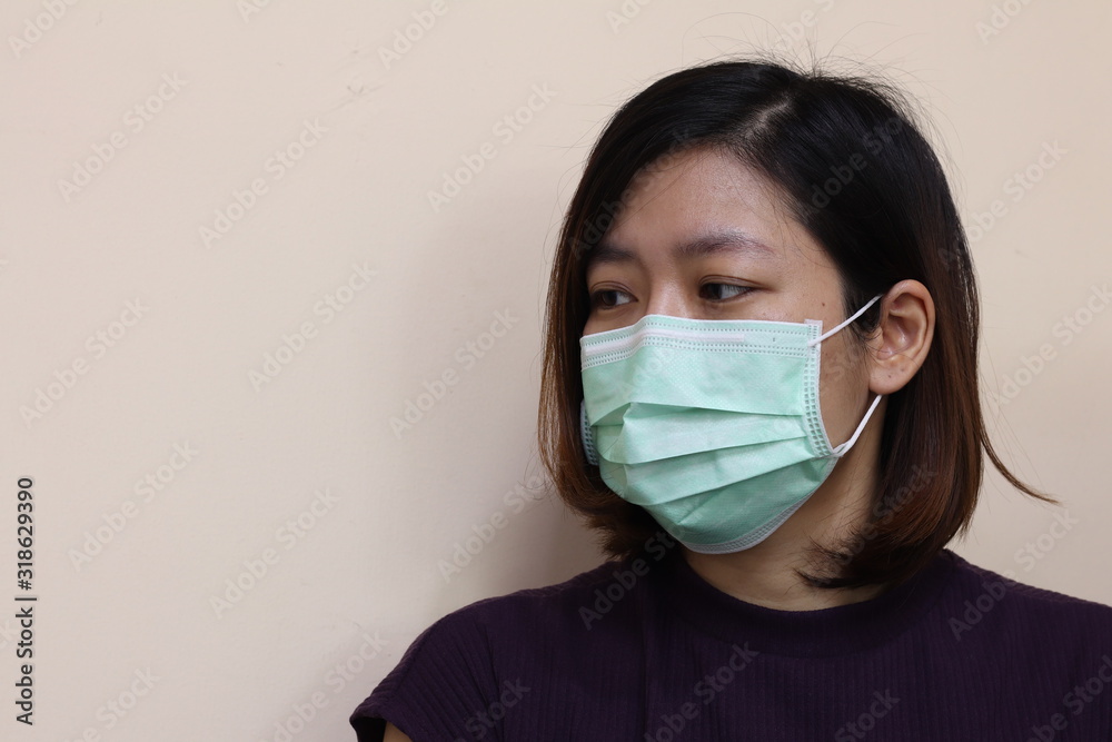 coronavirus concept. Asian woman wearing protective masks coughing ...