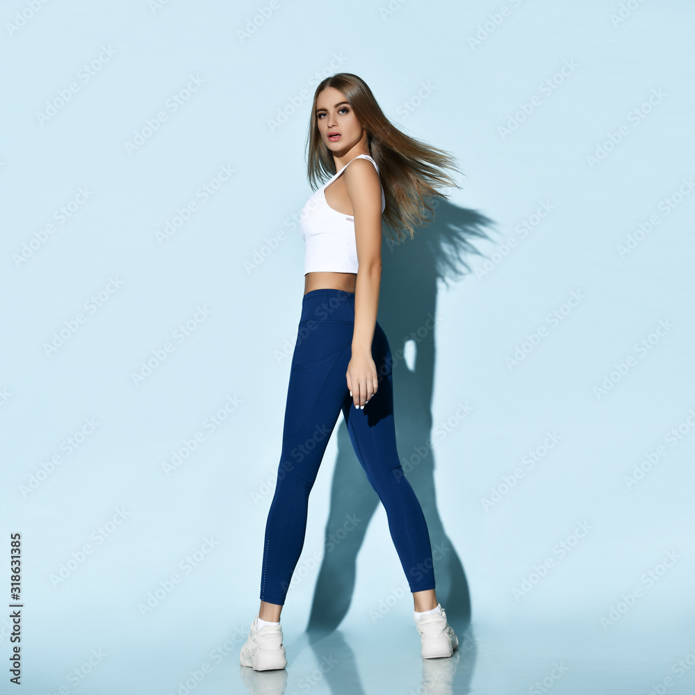 Beautiful sports woman in sport wear after working out sports exercises ...