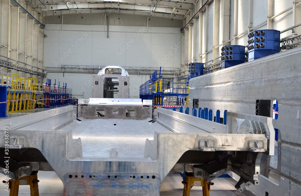 Inside of the rail car assembly plant. Industrial workshop for welding ...