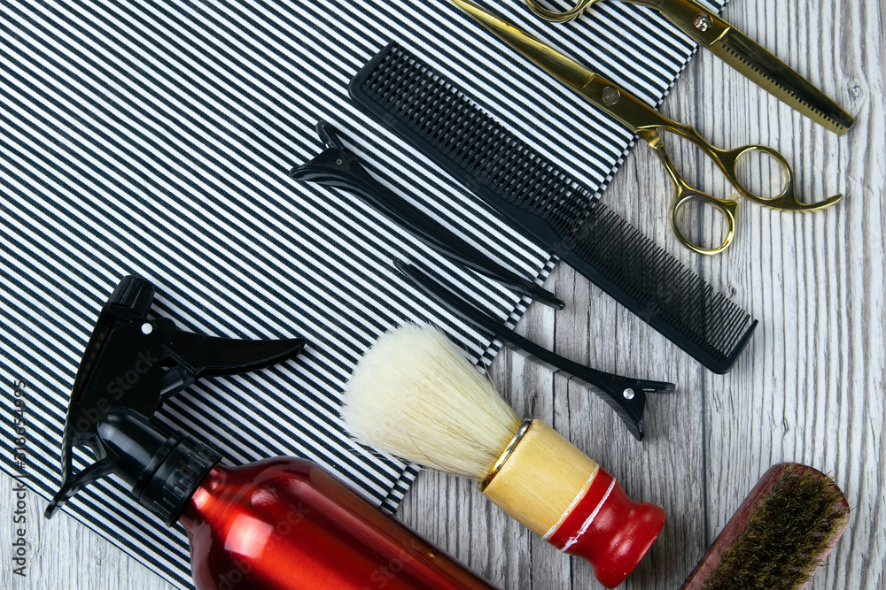 Barber's tool kit, pictured are scissors for hair cutting and hair ...
