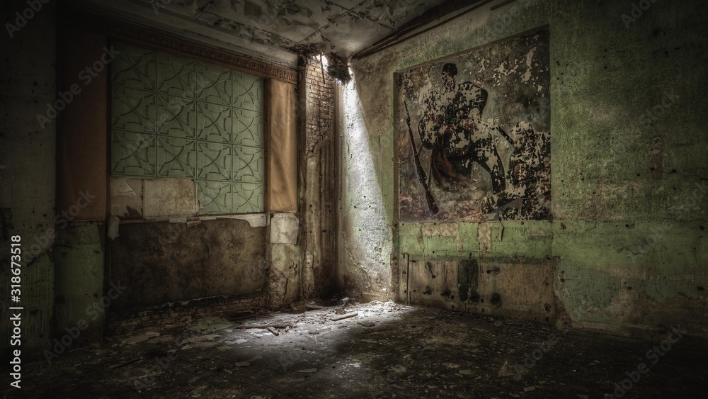 Old wall designs in an empty room with a messy floor of an old house ...