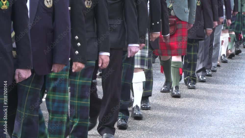 Stockvideon People in Kilts Marching during Parade in Scotland. Many ...