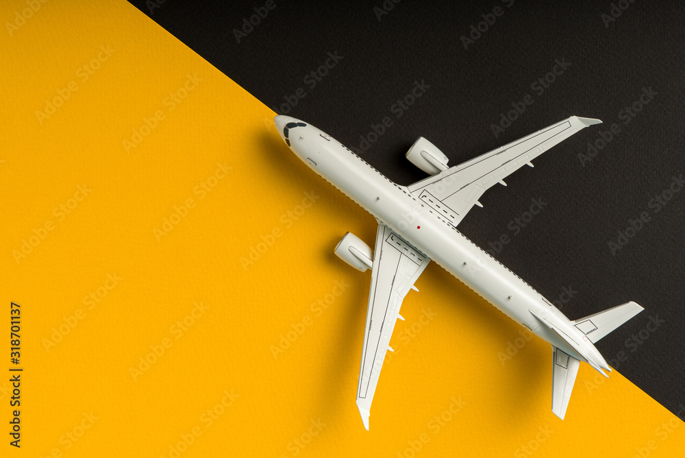 Plane on yellow and black background. Travel and aero space industry ...