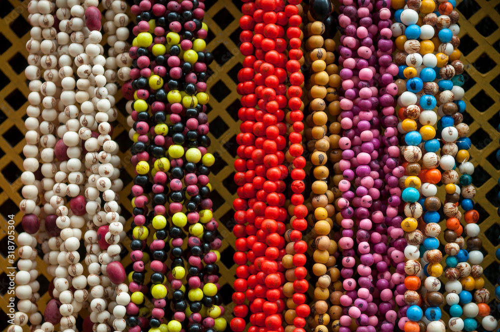 Brightly colored beaded necklaces representing the spirits of Candomble ...