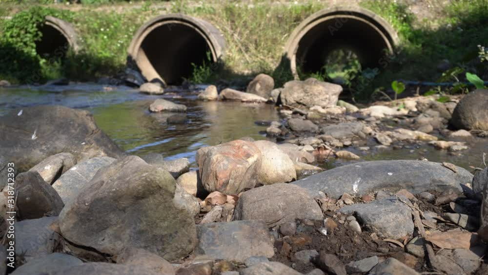 Reinforced concrete box culverts under the road with waterfall. Box ...