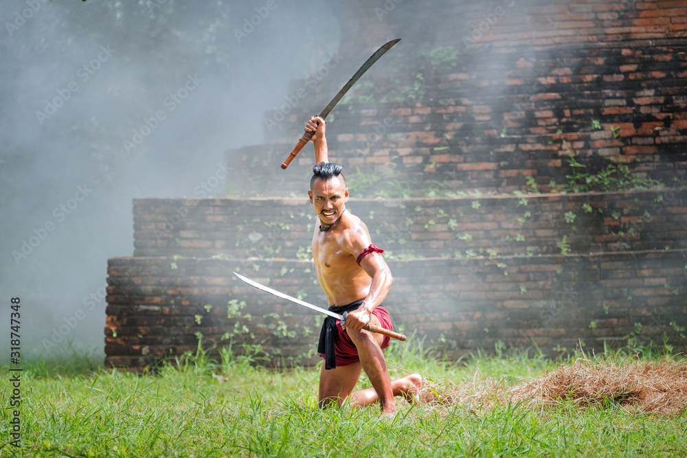 Full Length Portrait Of Shirtless Warrior With Swords On Grassy Field ...