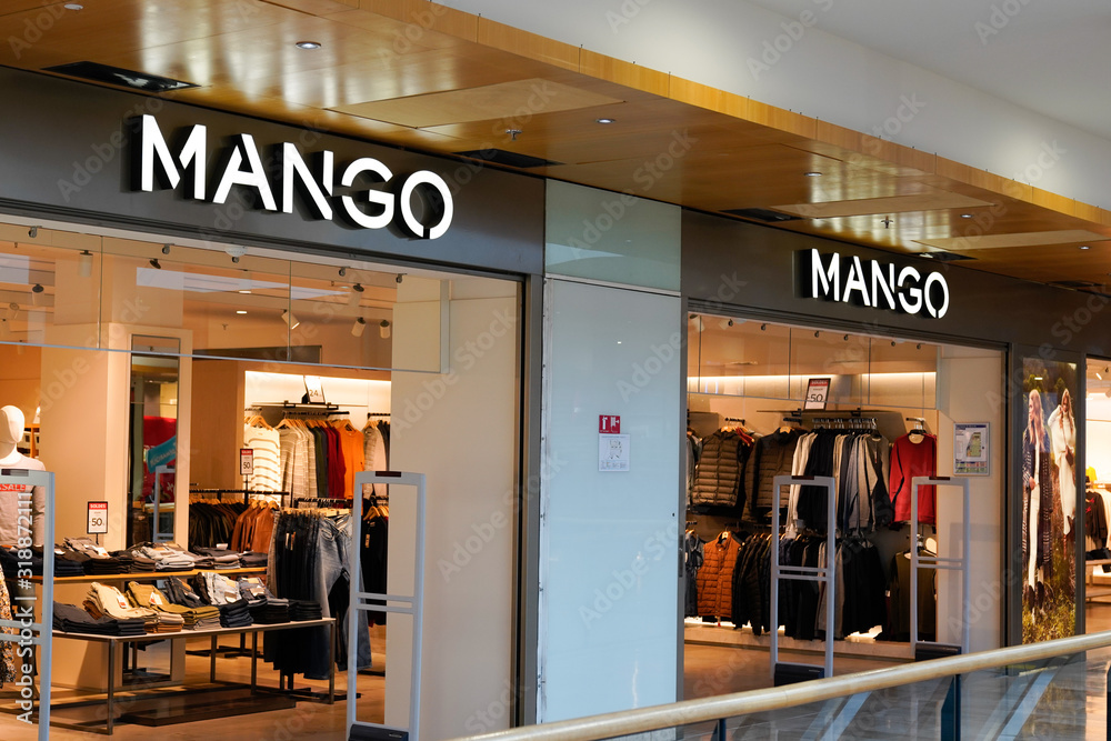 Mango store logo Spanish clothing shop front sign in street mall Stock ...