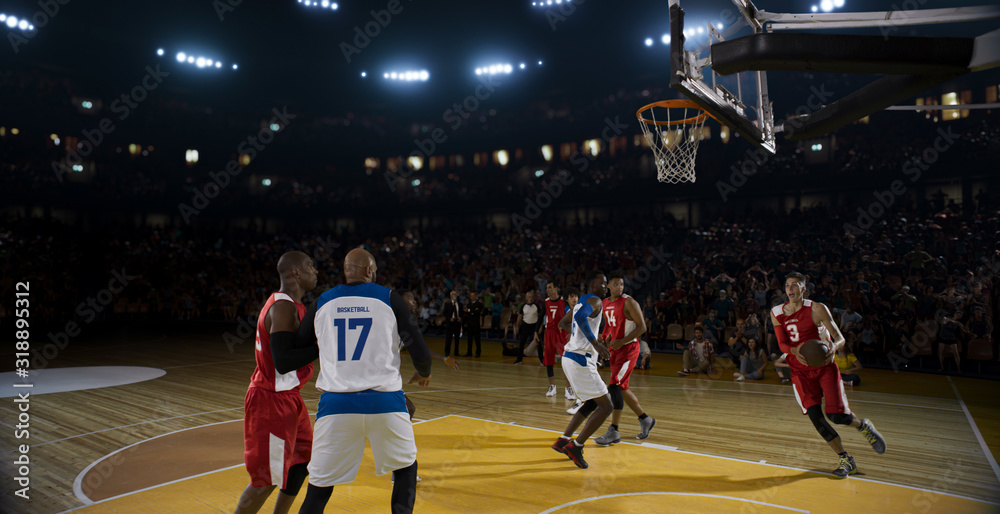 Basketball players on big professional arena during the game. Tense ...