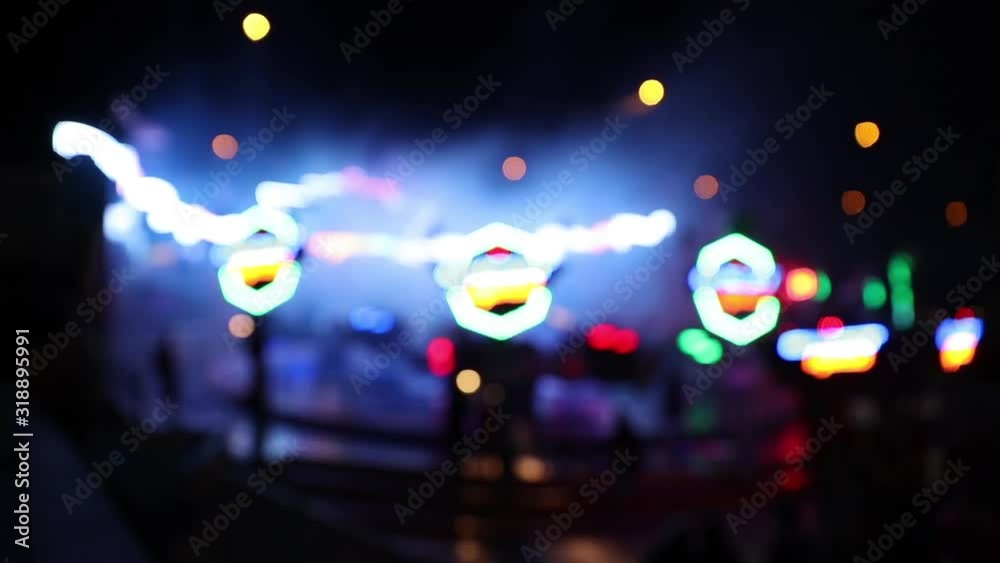 Carousel ride at night in action with blurry blinking lights Stock ...