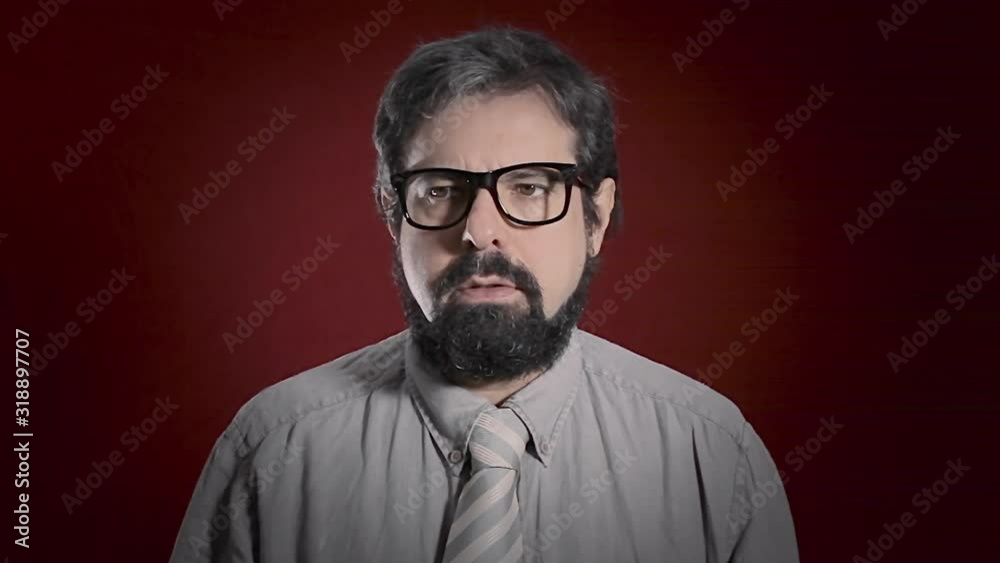 The expression of an alienated man. Medium close-up shot of the face ...