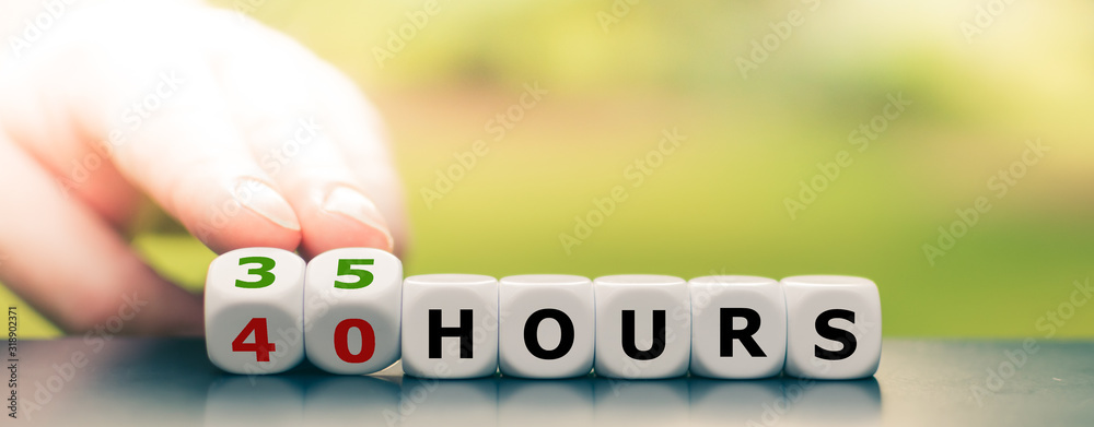 Symbol for a 35 hours work week. Hand turns dice and changes the ...