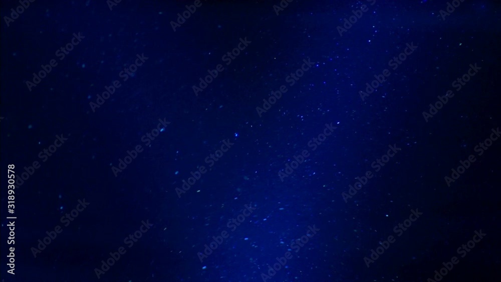 Dust particles in spot light of beam. Footage for your DVD, TEXT ...