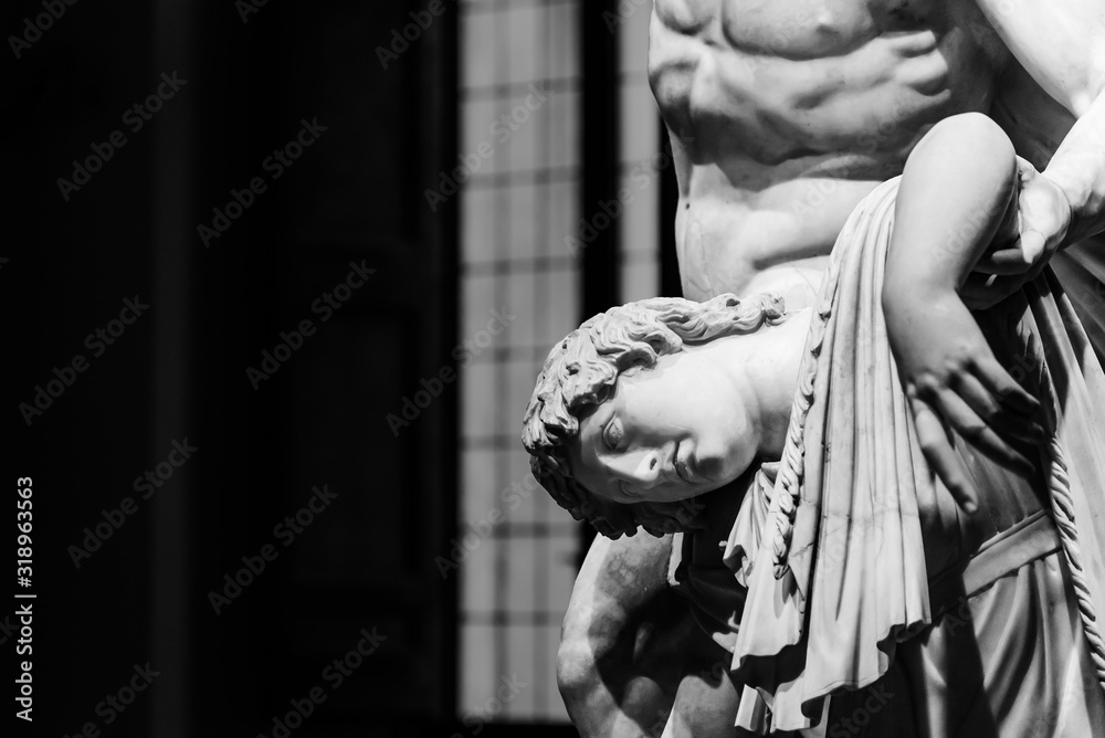 Detail of classical roman statue showing fainting young woman being ...