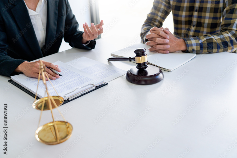 lawyer having meeting and consoling solution to his clients provide ...
