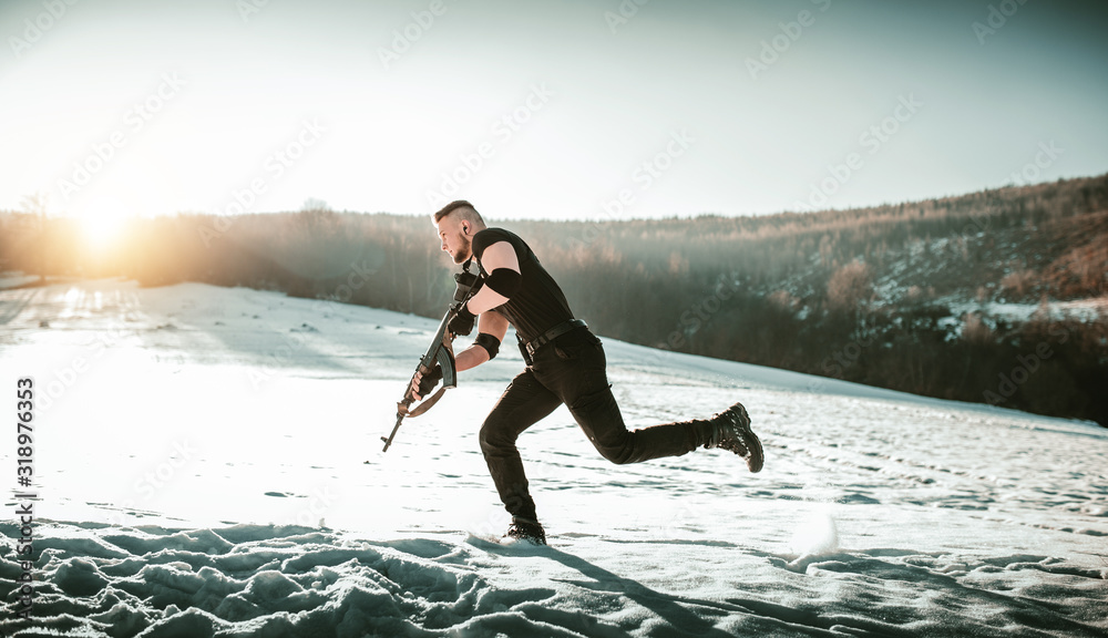 special forces soldiers with weapon take part in military maneuver. war ...
