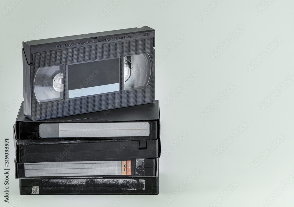 Stacked VHS tapes, isolated. Old VHS video cassettes with copy space ...