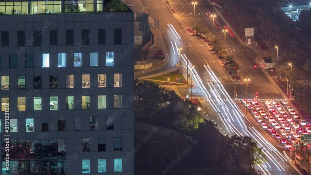 Skyline view of intersection traffic on Al Saada street near DIFC night ...