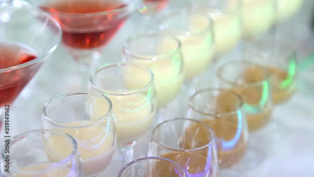 Colored cocktails on the table. Alcoholic drinks on the buffet table ...