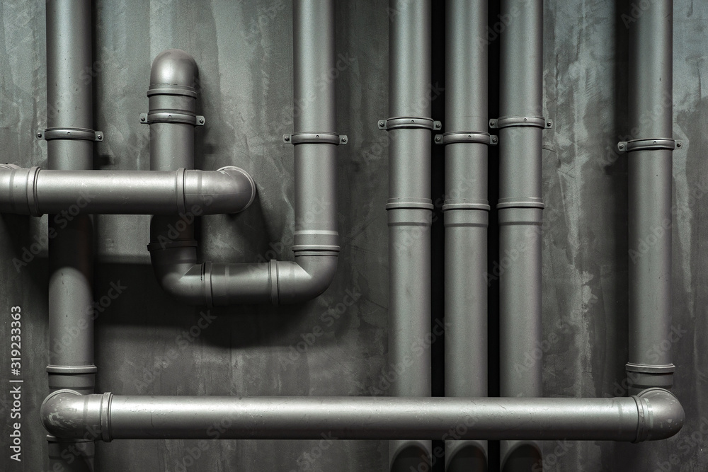 Vintage wall texture background with plastic pipes for design and ...
