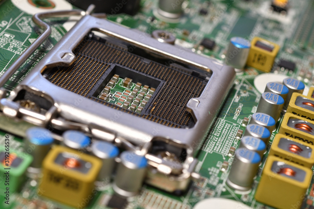 Detail of cpu socket on a modern computer motherboard. Electronic small ...