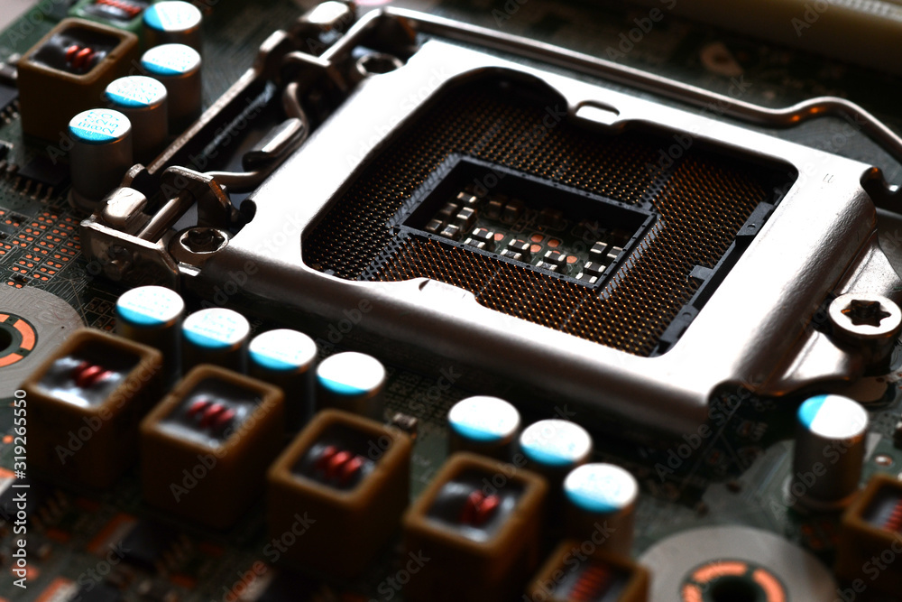 Detail of cpu socket on a modern computer motherboard. Electronic small ...