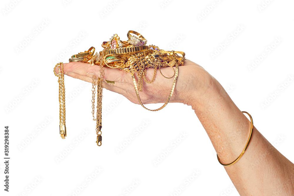 Hand Holding Gold Jewelry Stock Photo | Adobe Stock