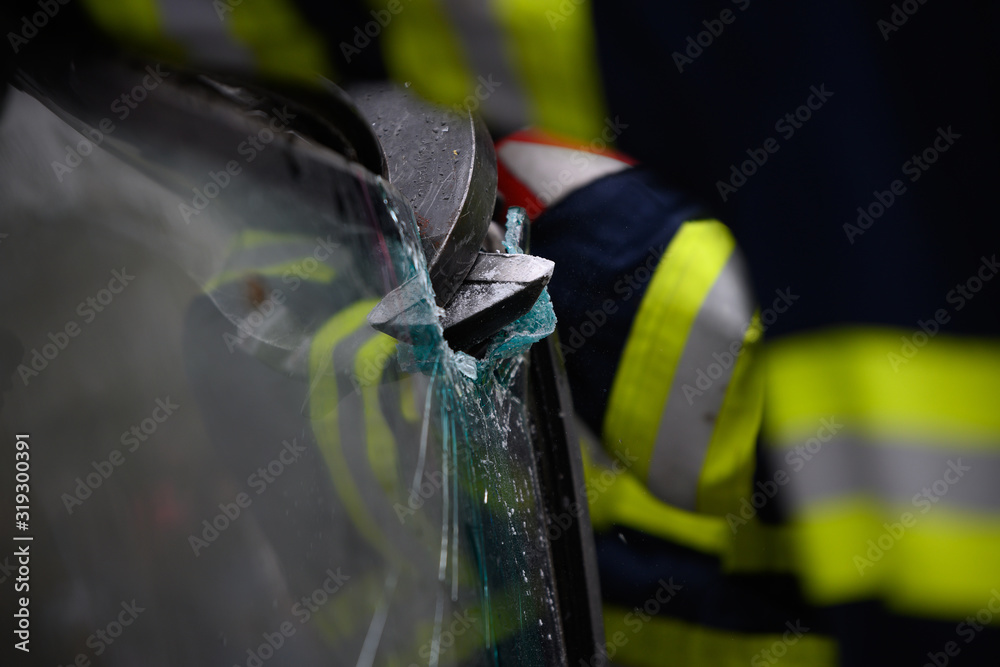Car wrecked in accident receiving assistance from intervention team in ...