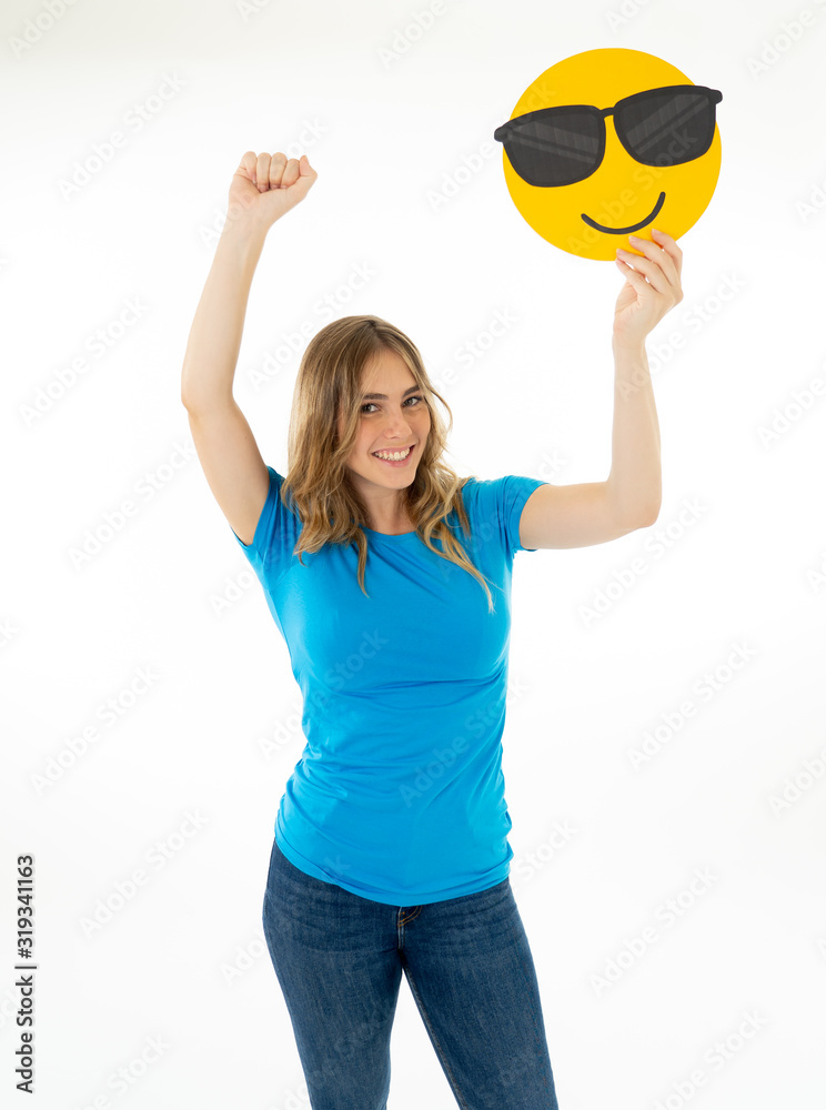 Beautiful young woman holding happy face emoji emoticon social media ...