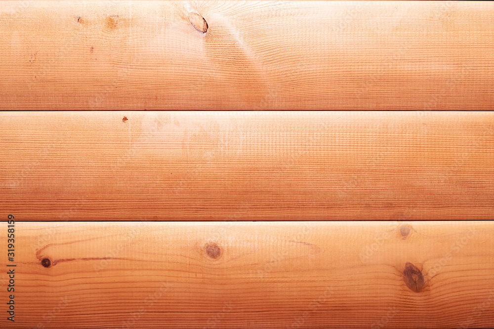 Wooden wall and floor cladding boards of brown color. Exterior and ...