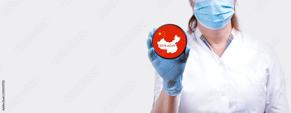 Female doctor hand holding stop sign coronavirus 2019-nCoV against flag ...