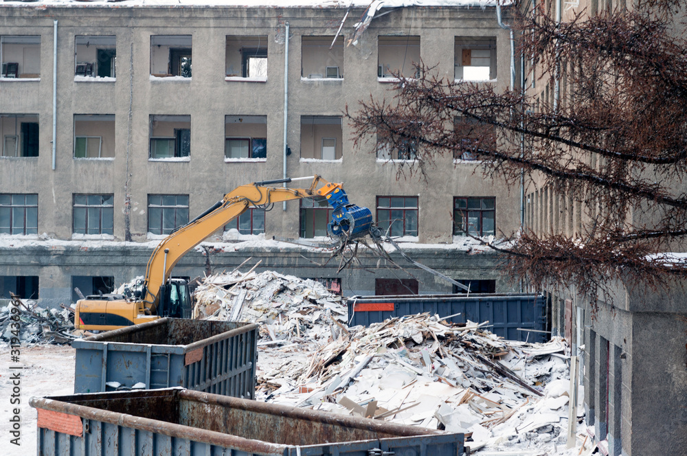 Dismantling, destruction of a multi-storey building with the help of a ...