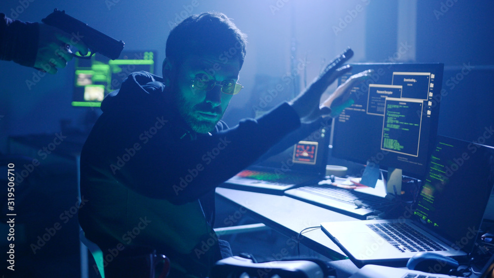 Profile of man trying to hack server and steal important data on laptop ...