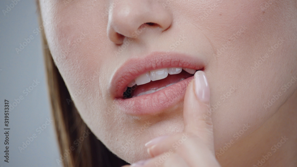 Close-up young woman mouth smiling happy beautiful soft lips showing ...