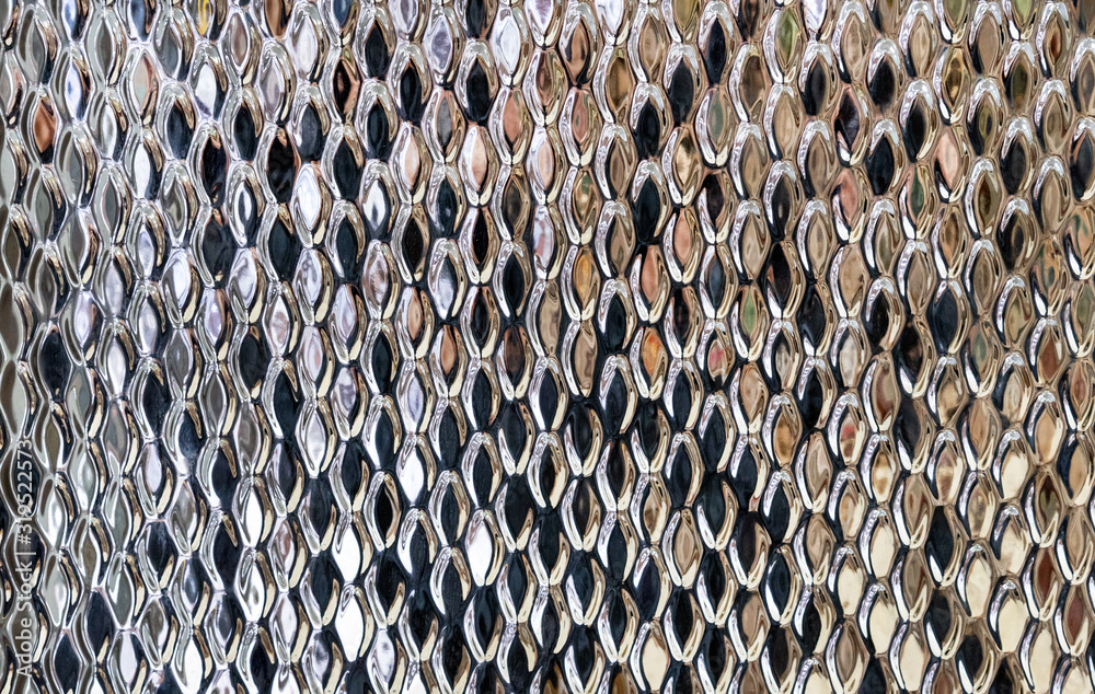 Metal panel with ornament in form fish scale. Background with ...