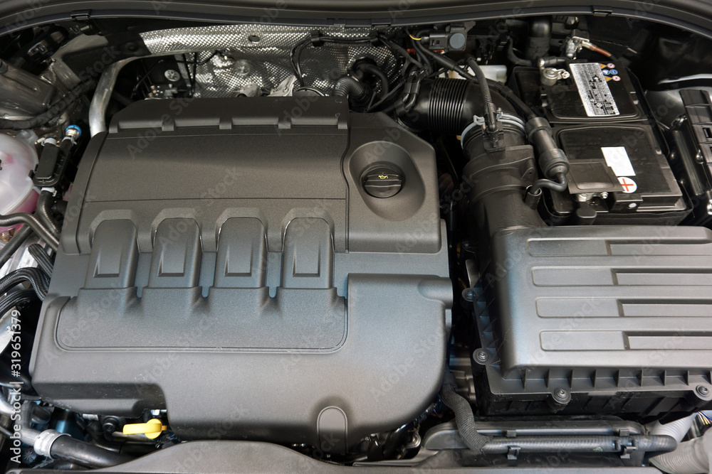 The engine of a modern luxury car, the cover protects the engine from ...