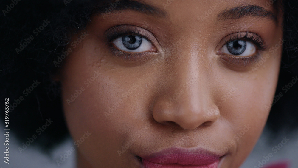 Close Up View Of Sexy Beautiful African Girl Rouging Her Lips With