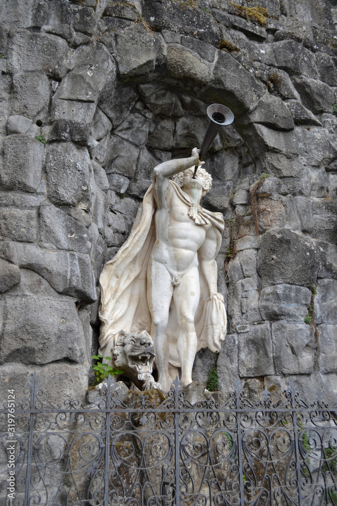 God Triton blows a bugle, sculpture ancient Roman God messenger of the ...