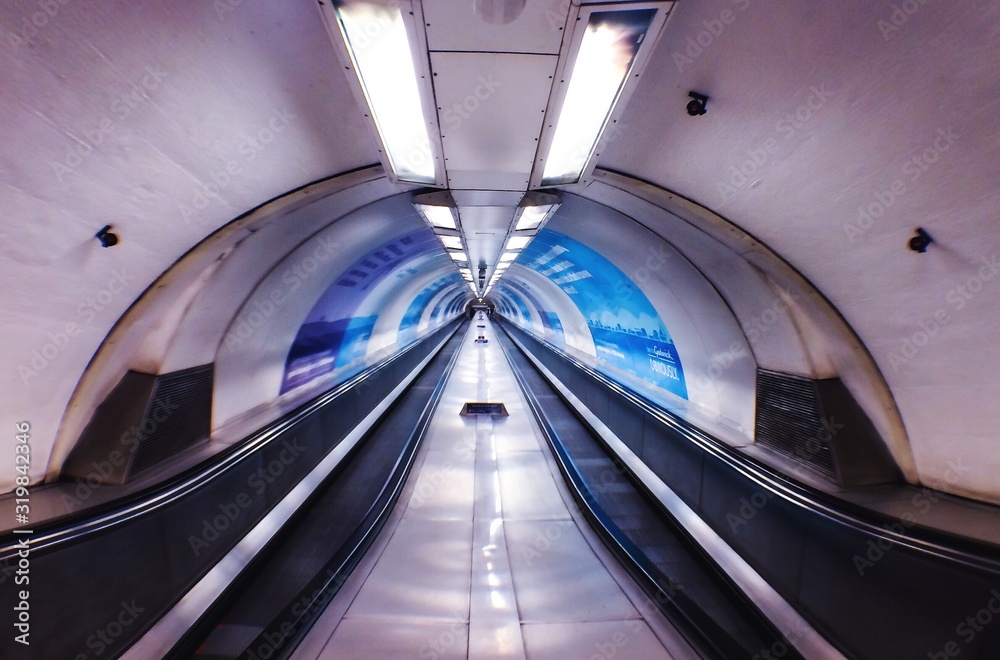 Illuminated Moving Walkway In Modern Building Stock Photo | Adobe Stock