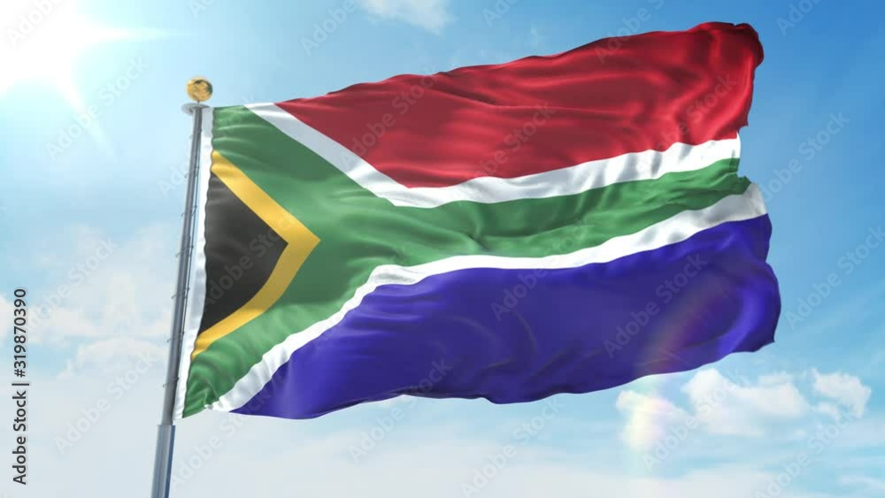 South Africa flag waving in the wind against deep blue sky. National ...