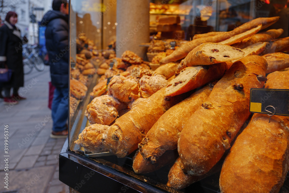 View of cutting heap and stack of Olive French Baguettes, and various ...