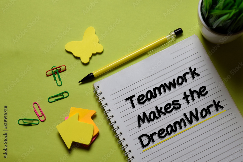 Teamwork Makes The Dreamwork write on a book isolated on office desk ...