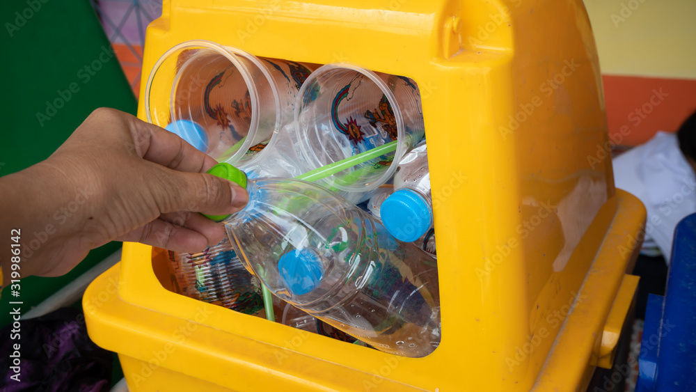 plastic garbage bin full of trash. Overflowing garbage Stock Photo ...