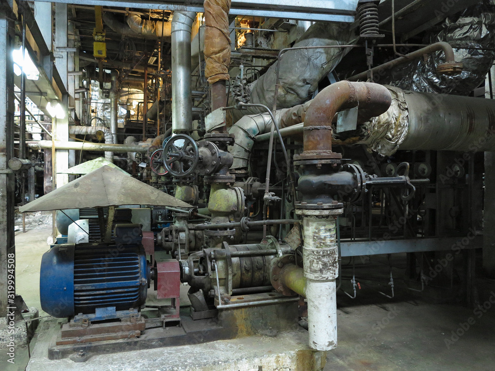 Industrial big water pumps with electric motors, pipes, tubes ...